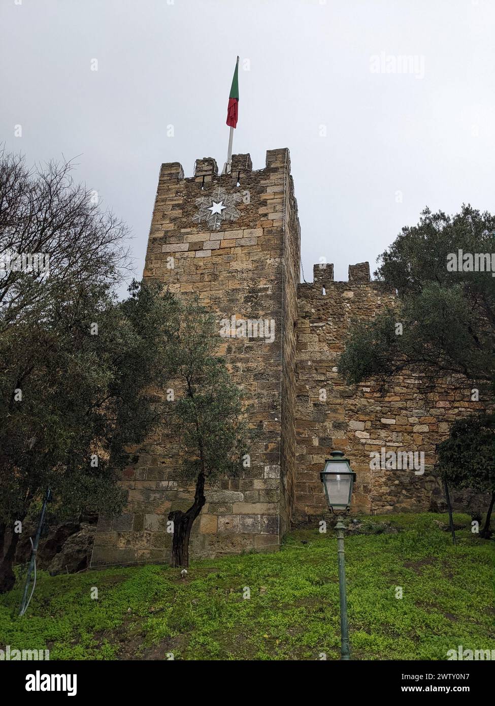 Medieval ruins with clock tower and trees Stock Photo - Alamy