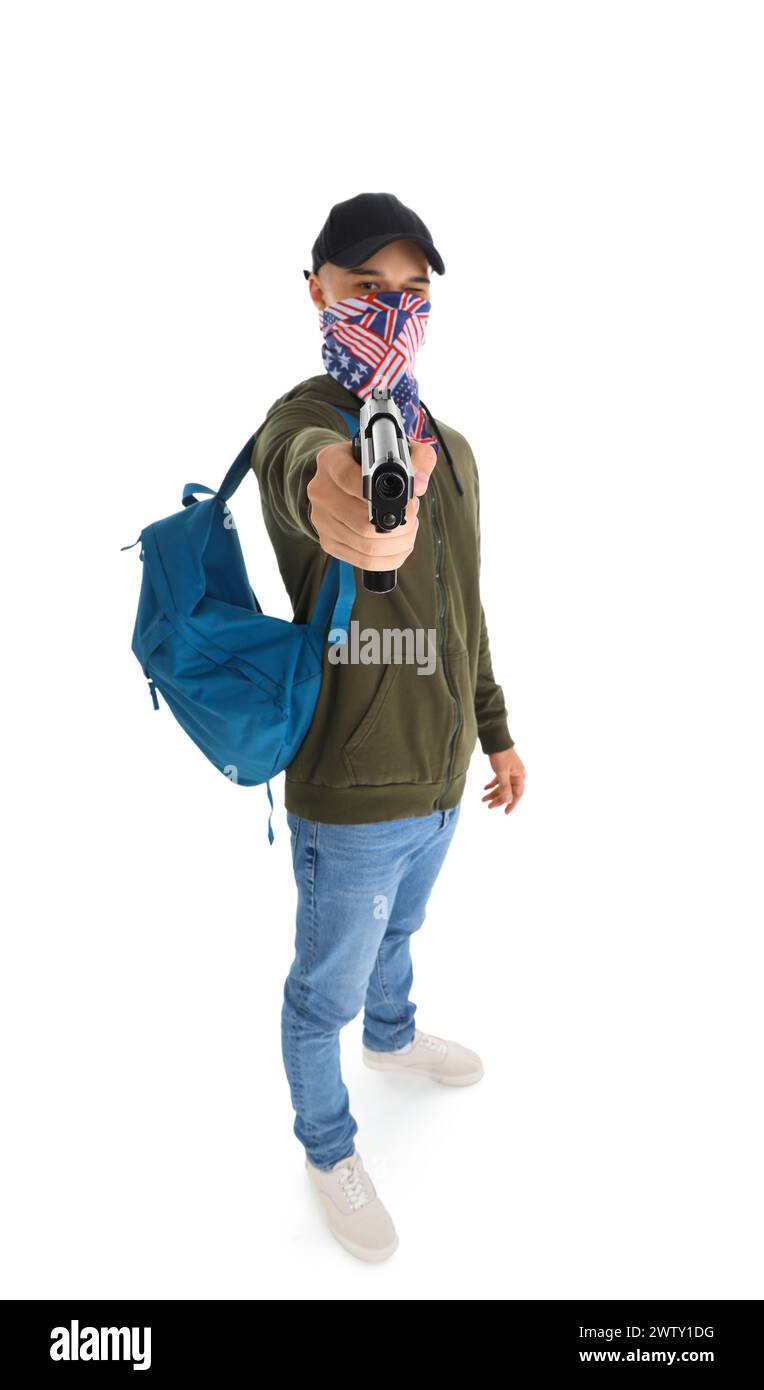 Male student with gun on white background. School shooting concept ...