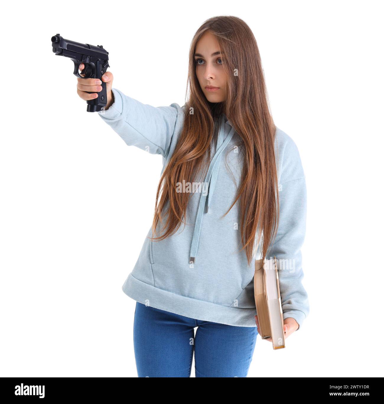 Female student with gun on white background. School shooting concept ...