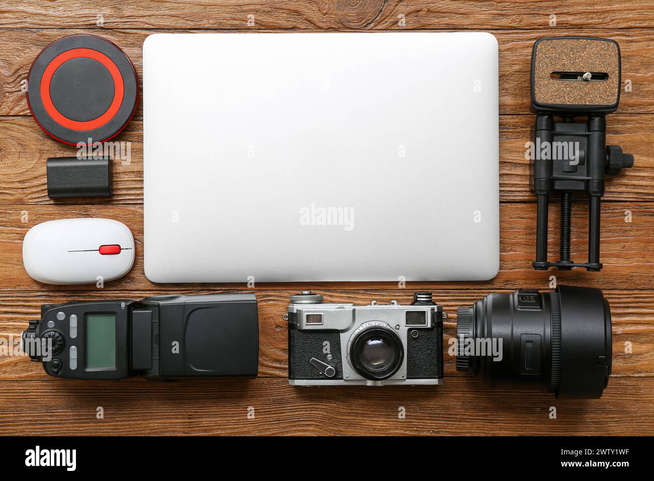 Set of different gadgets with modern laptop on wooden background Stock ...