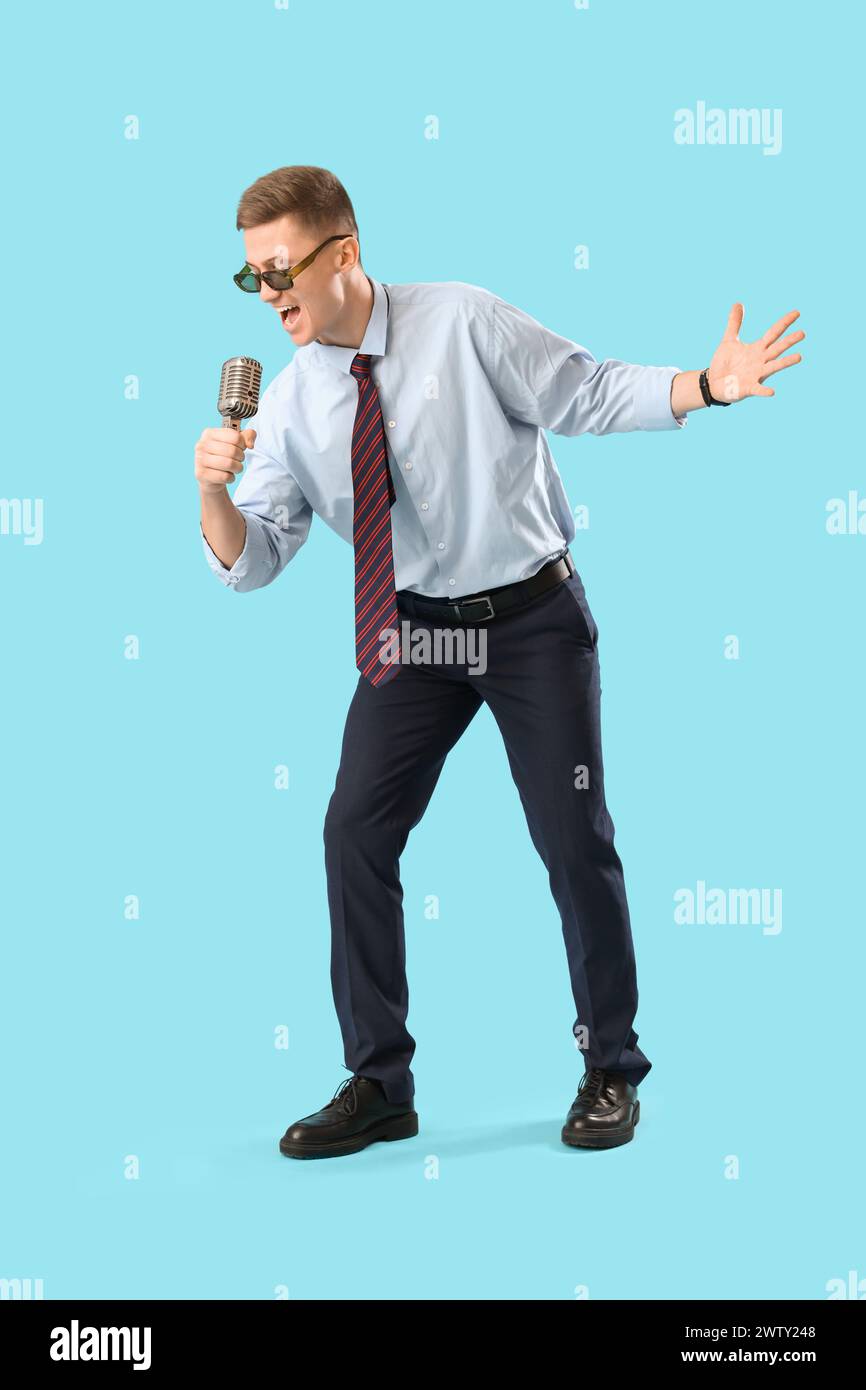 Businessman singing microphone hi-res stock photography and images - Alamy