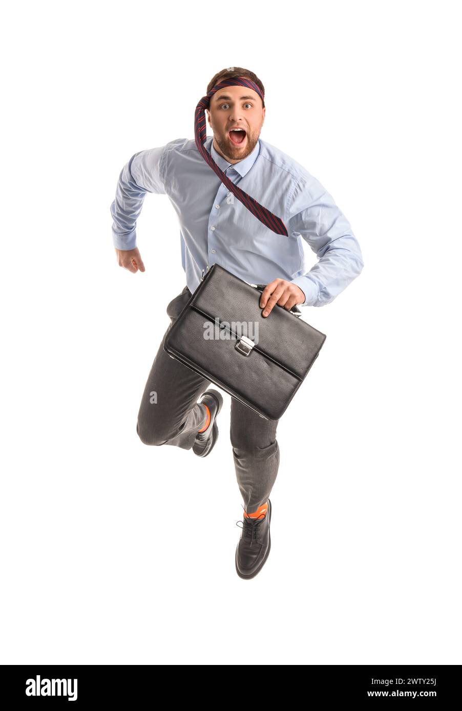 Funny businessman with necktie around his head and briefcase jumping on ...