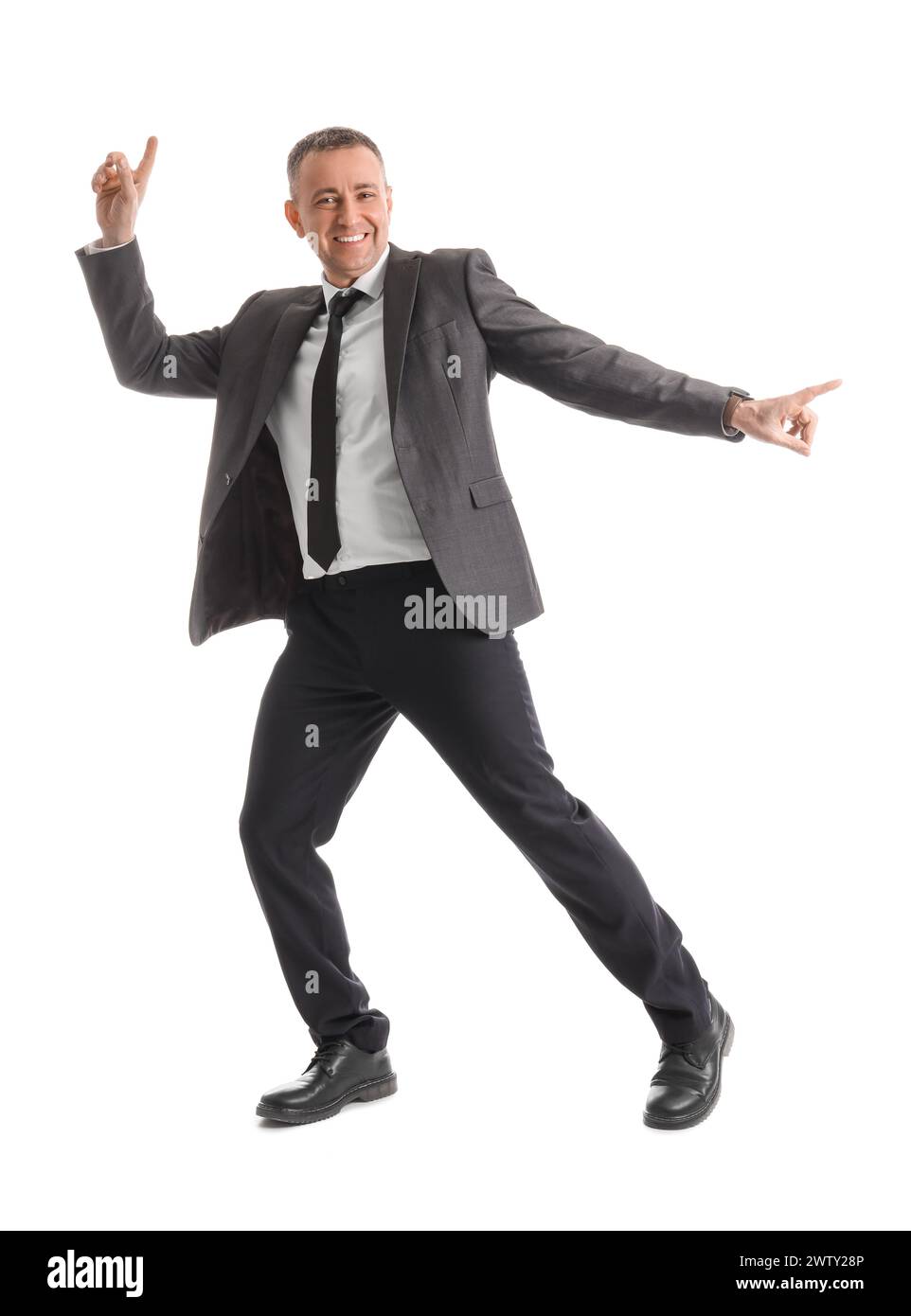 Funny businessman dancing on white background Stock Photo - Alamy