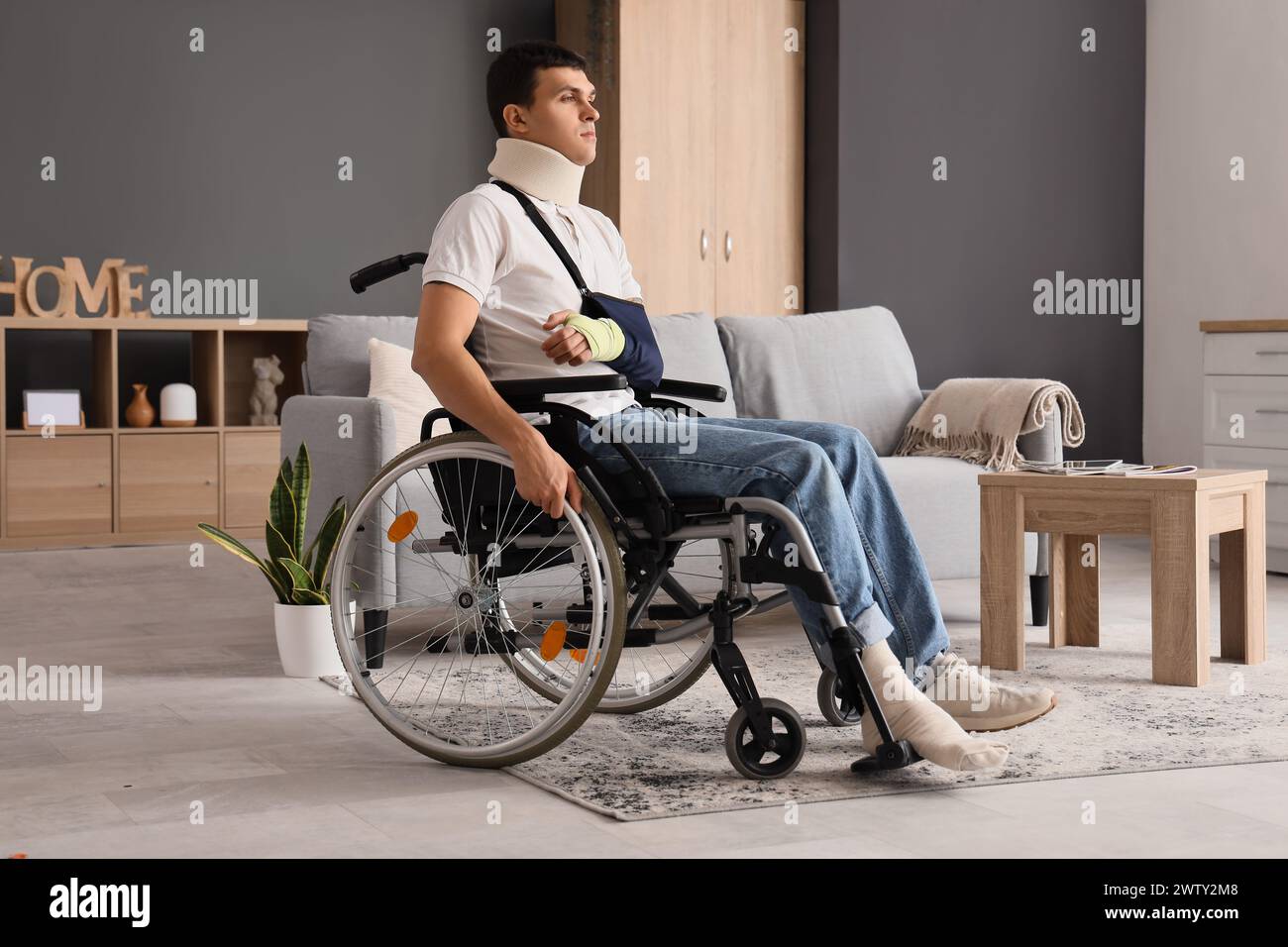 Man sitting in wheelchair broken hi-res stock photography and images ...