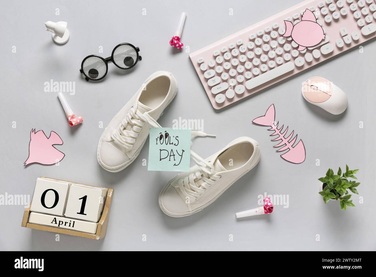 Shoes with tied laces, computer keyboard and calendar on white ...