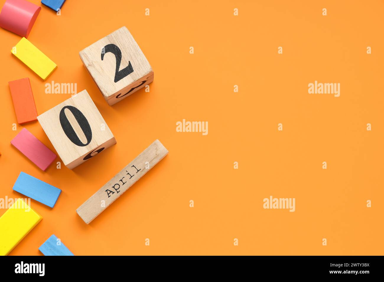 Calendar and plasticine on orange background. Autism disorder concept ...