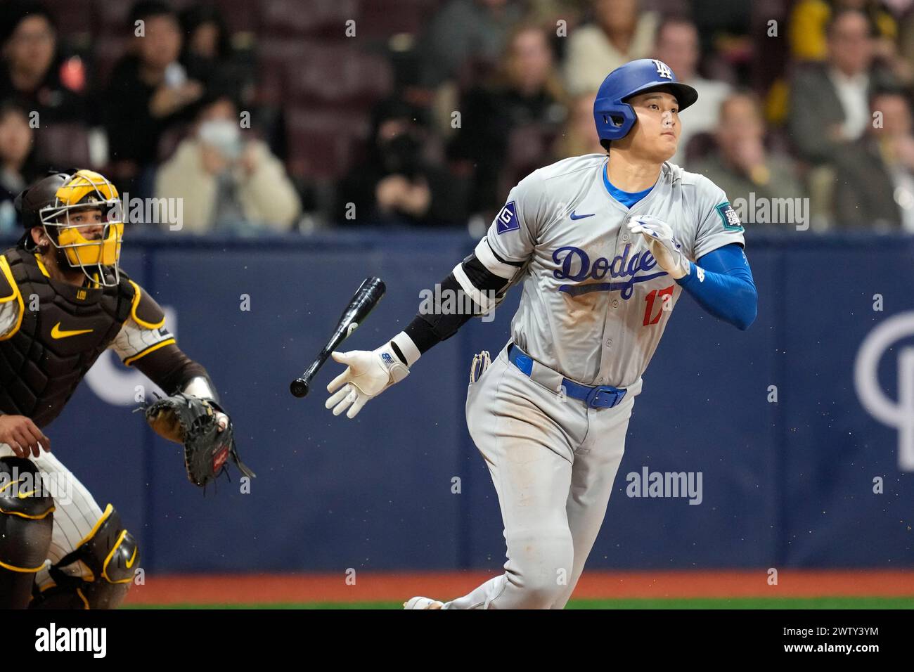 Los Angeles Dodgers designated hitter Shohei Ohtani, right, heads to ...