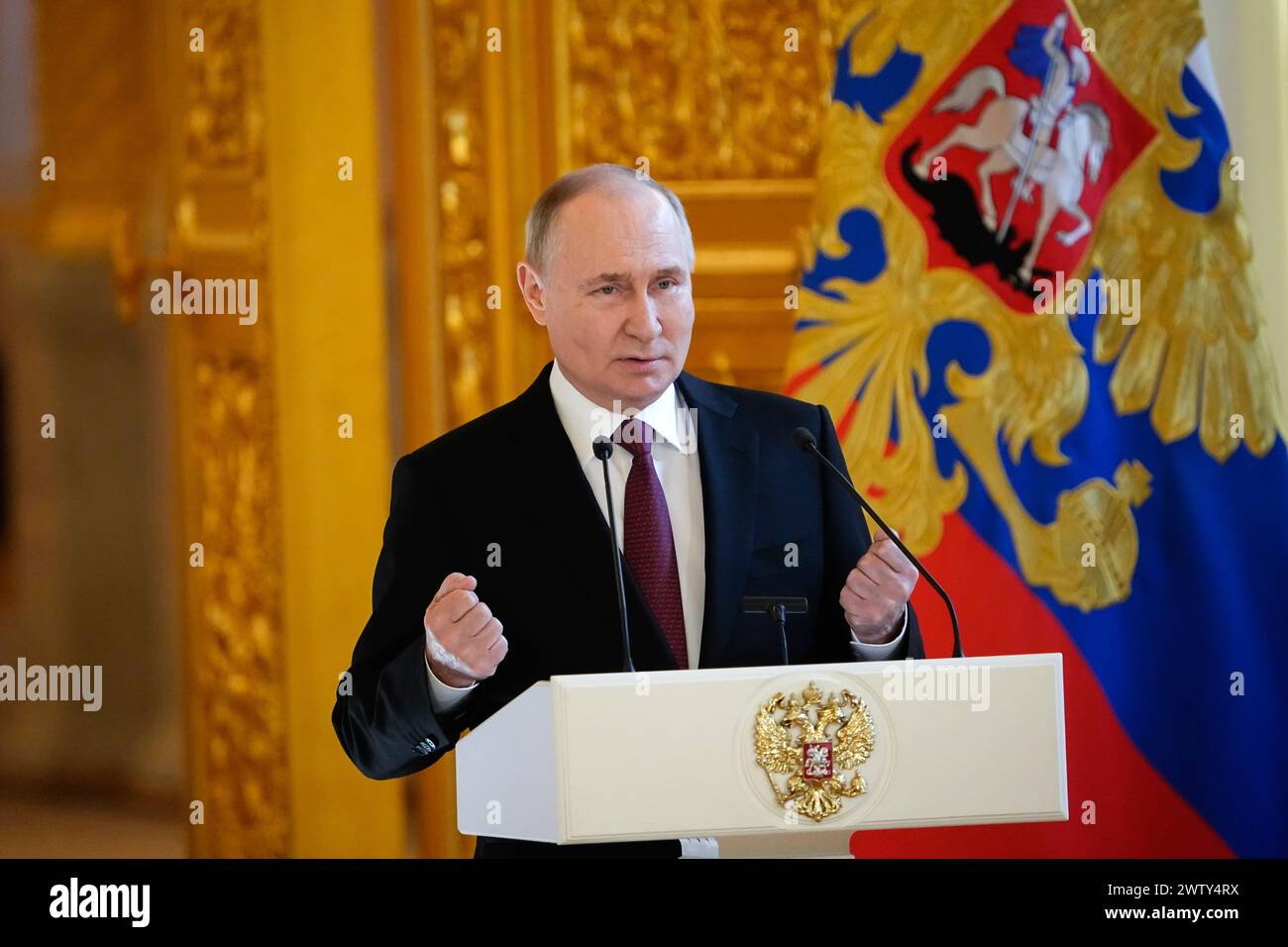 Russia President Vladimir Putin gestures as he delivers a speech during ...