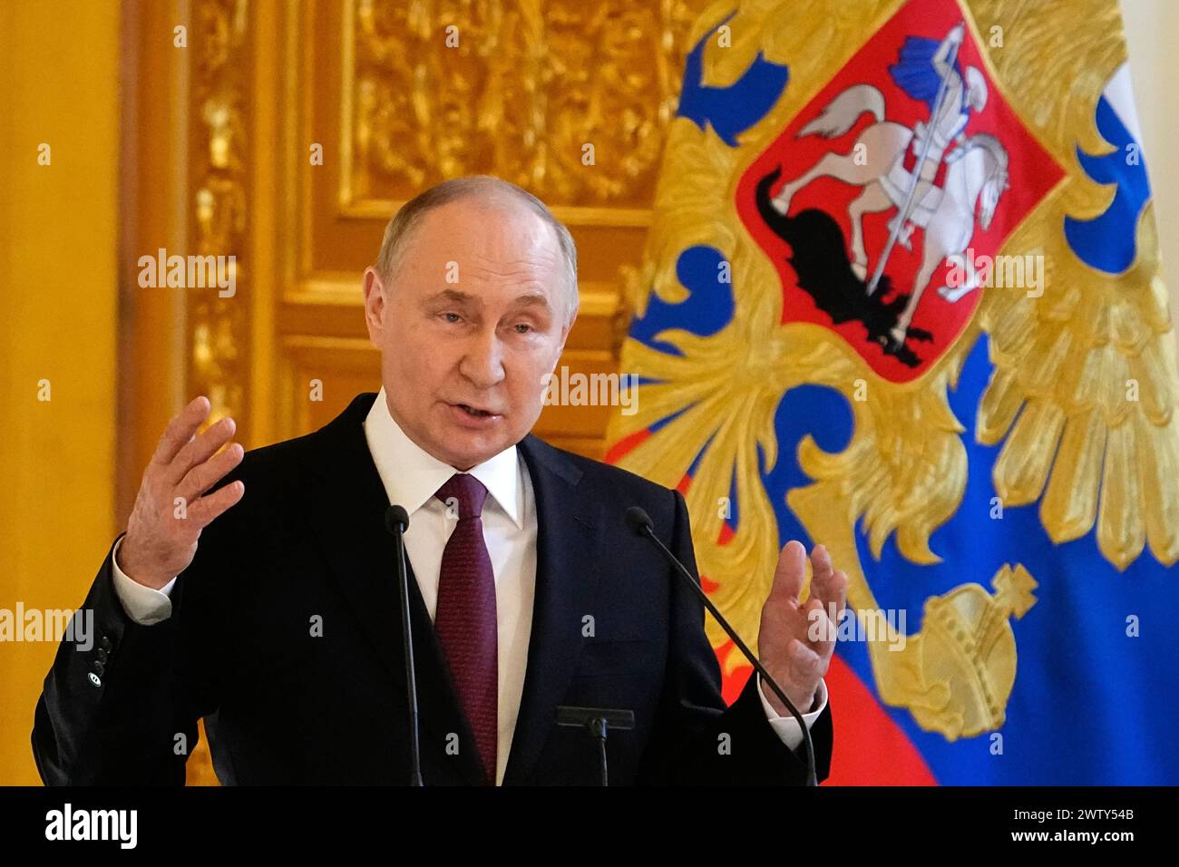 Russia President Vladimir Putin gestures as he delivers a speech during ...