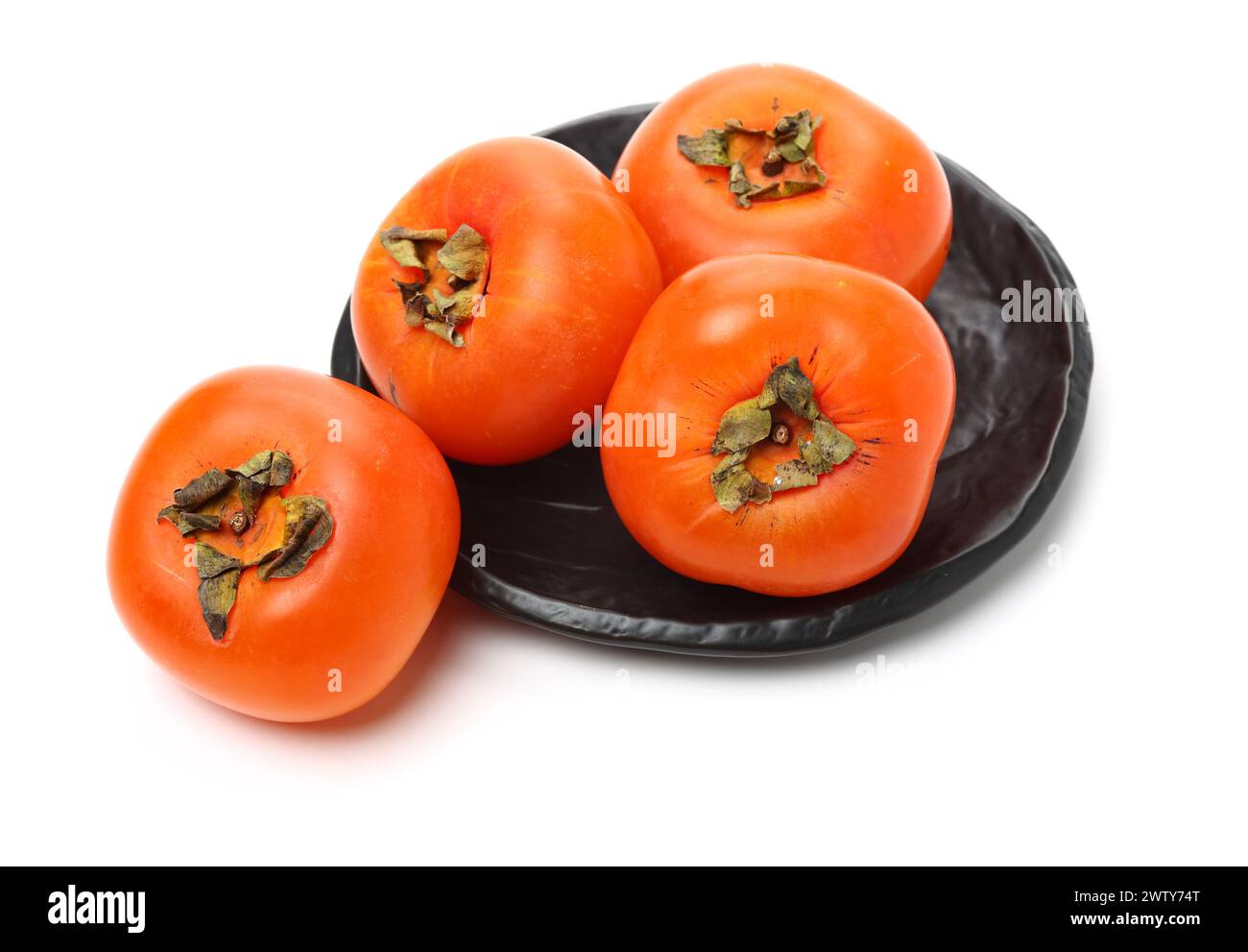 persimmon on a white background Stock Photo - Alamy