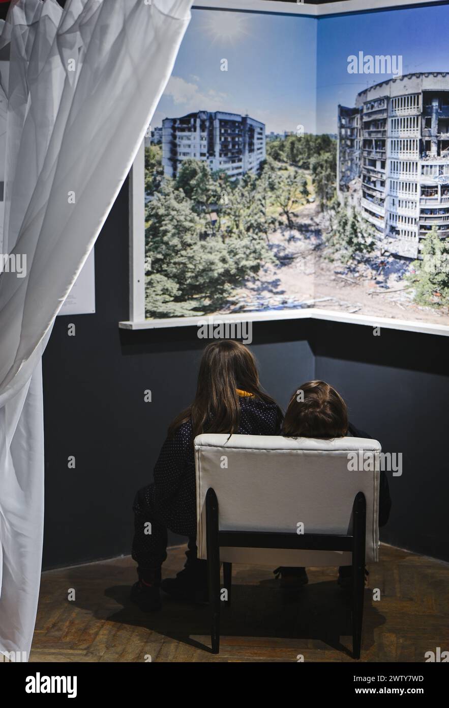 LVIV, UKRAINE - MARCH 19, 2024 - Young visitors of the exhibition "Here Was My" at the Porokhova ...