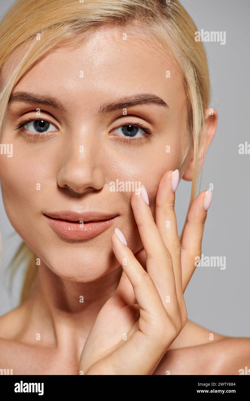 beautiful blonde in 20s with gray eyes, slight smile and perfect skin ...