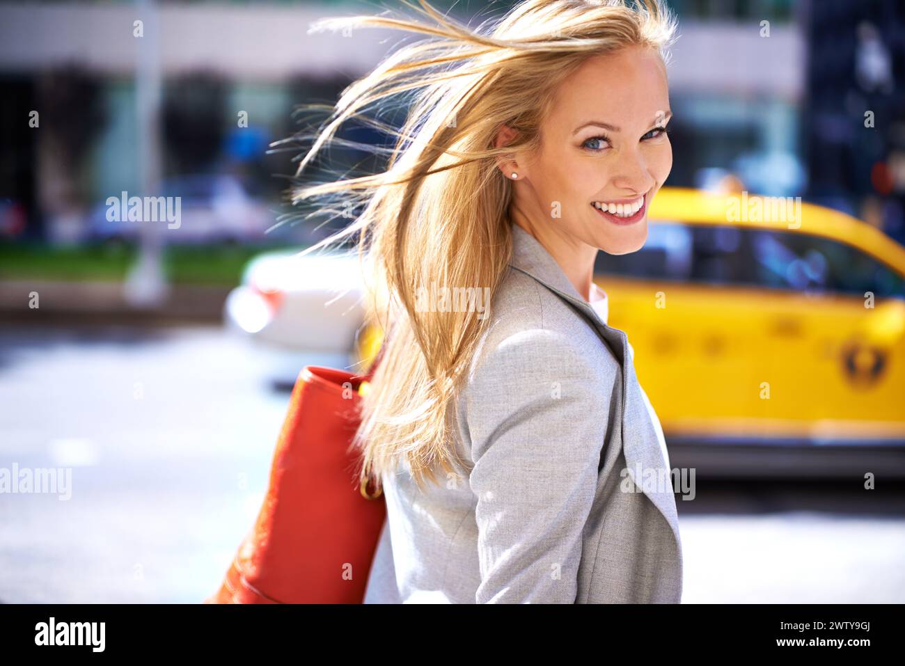 Woman, portrait and smile with street, walk and commute for work or ...