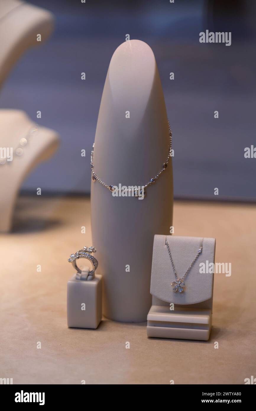 Luxurious and elegant diamond accessories displayed on a window of a ...