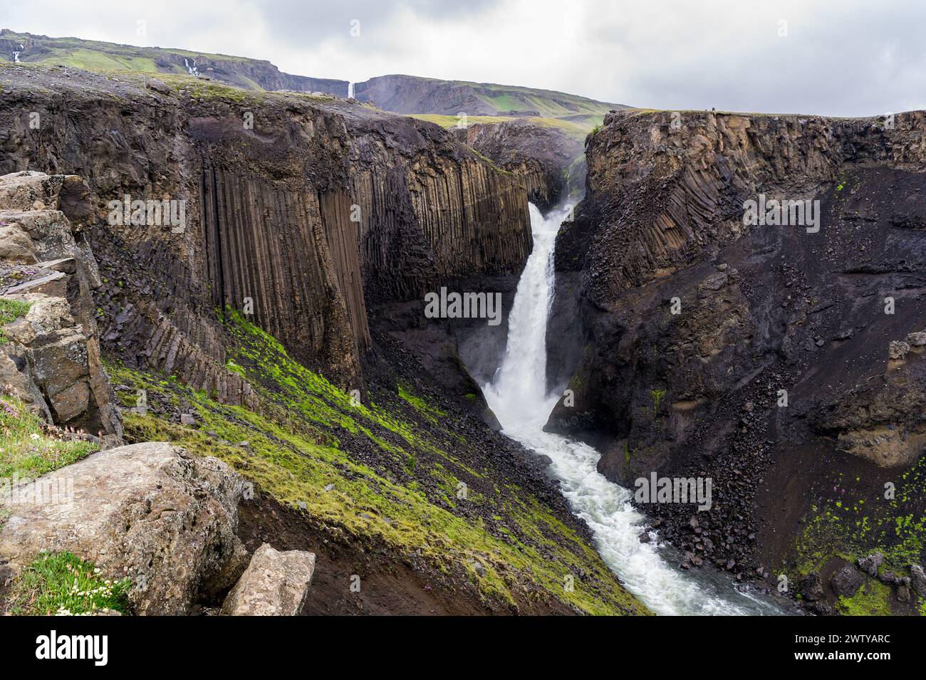 Famous Litlanesfoss waterfall near Hengifoss in Iceland Stock Photo - Alamy