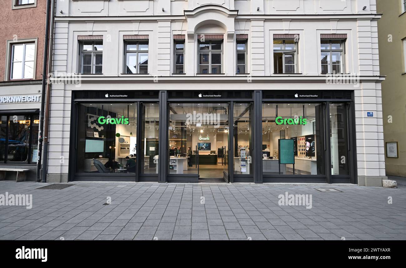 Munich, Germany. 19th Mar, 2024. The "Gravis" lettering shines green in ...