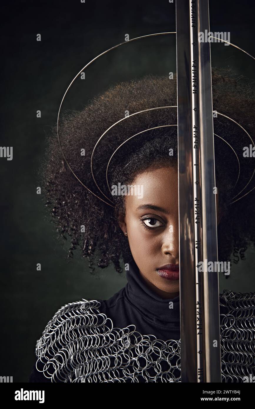 Half-face portrait of African woman with circular halos around her head ...