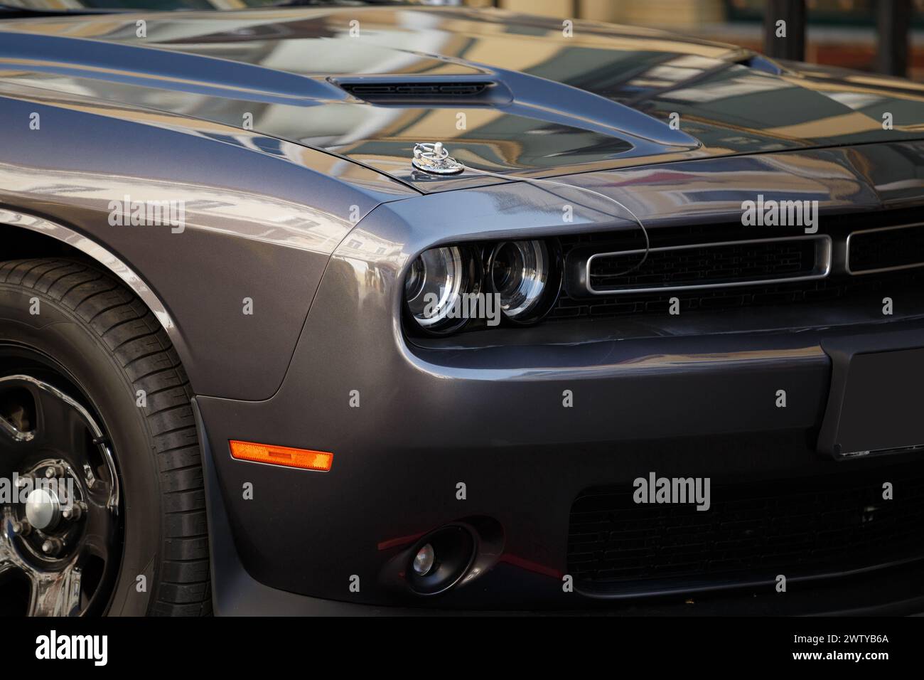 Headlights and front wheel of a modern car close-up, elegant auto ...
