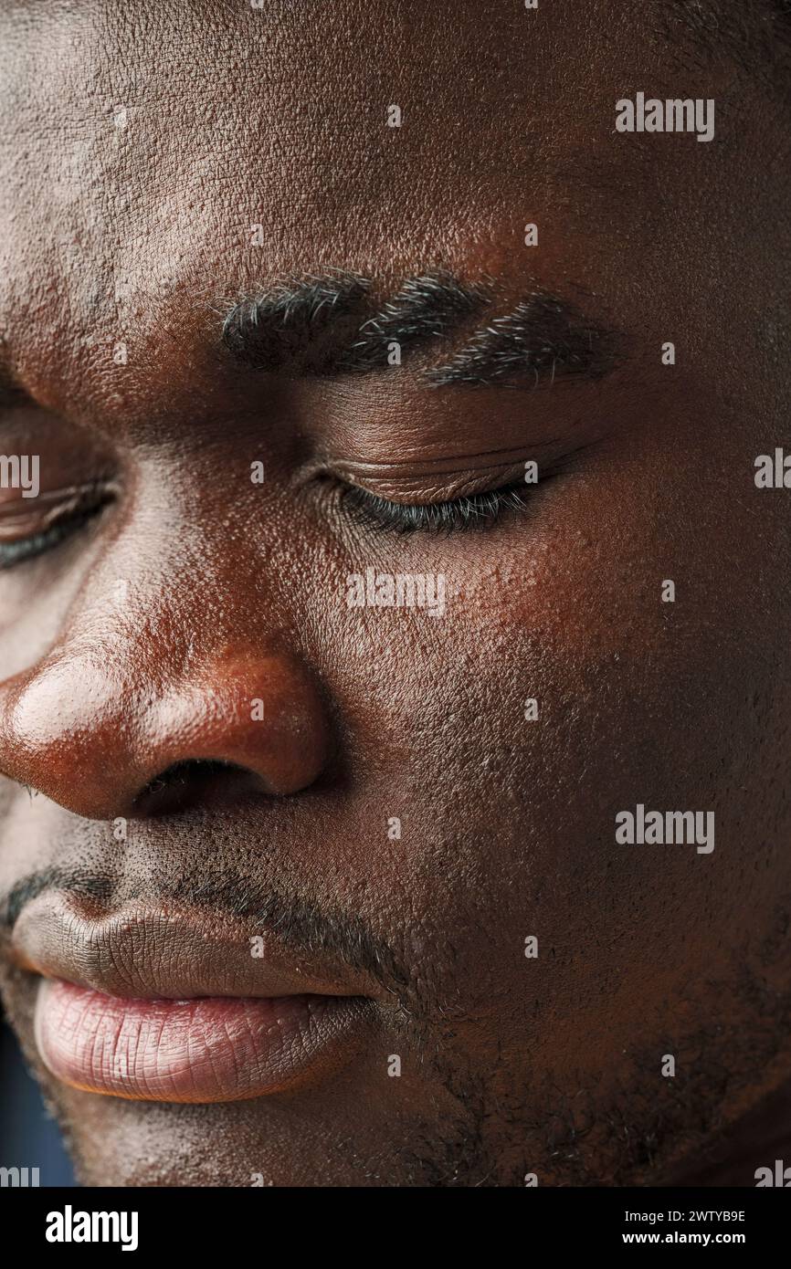 Close Up of African Mans Face With Brown Eyes Stock Photo - Alamy