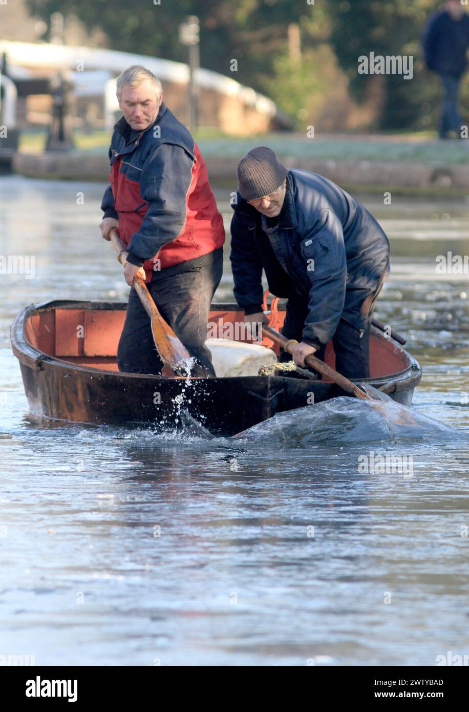 03/02/12. ..Marine Engineers, Andy Poacher and Graham Donohue, use oars ...