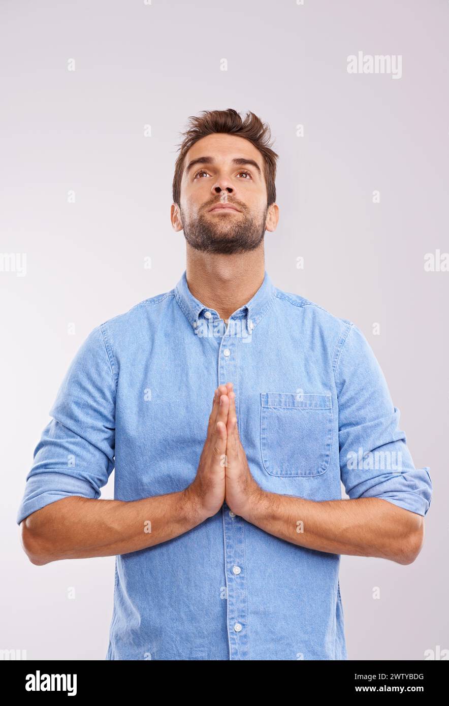 Man, praying and worship with praise for God, seek help and advice for ...
