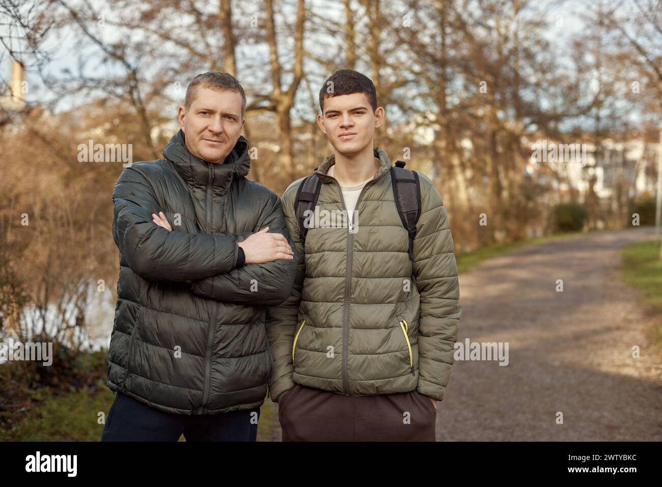 Father-Son Bond: Handsome 40-Year-Old Man and 17-Year-Old Son Standing ...