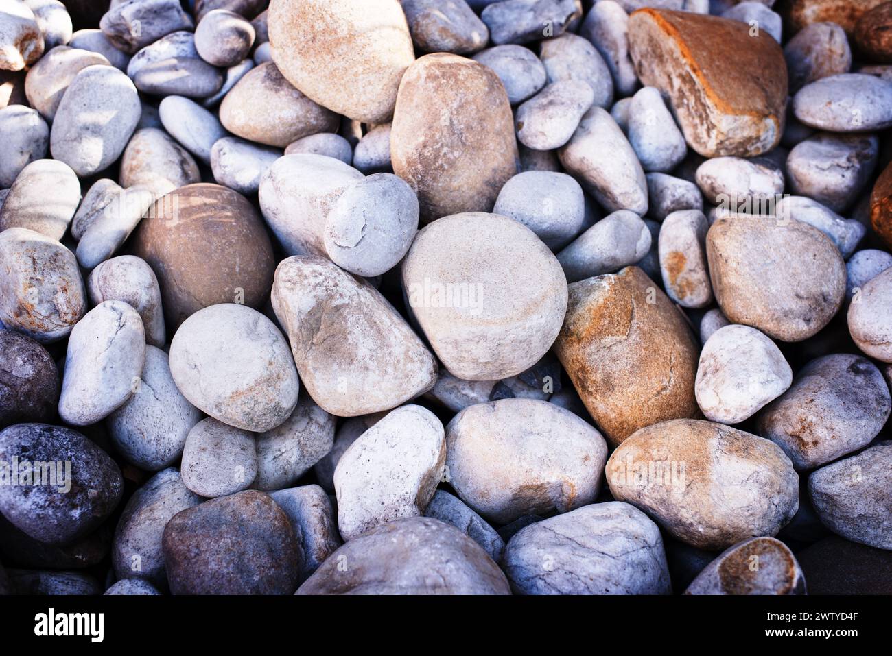 Rock, pile and stone on ground closeup outdoor with detail on texture ...