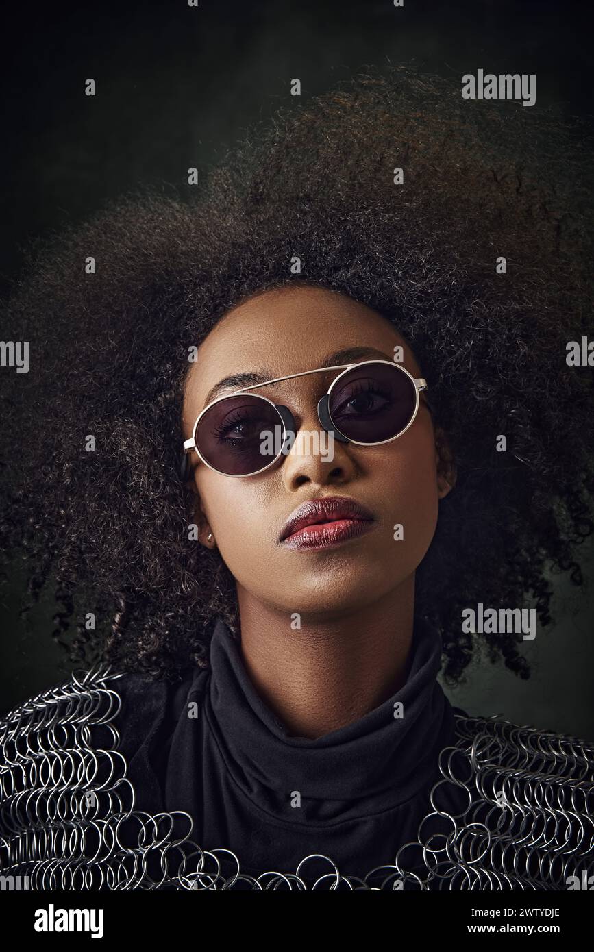 Portrait of young African-American woman with curly hair, wearing ...