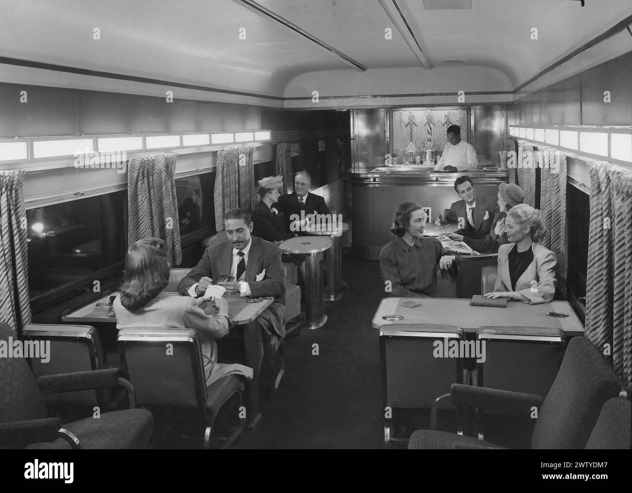 Passengers dining in the lounge car on a train called Super Chief Stock ...