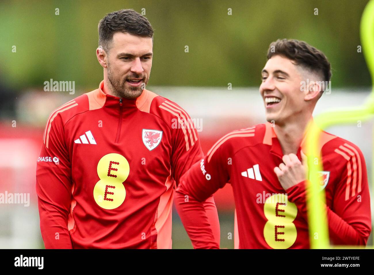 Aaron Ramsey and Harry Wilson of Wales share a joke during warms up ...