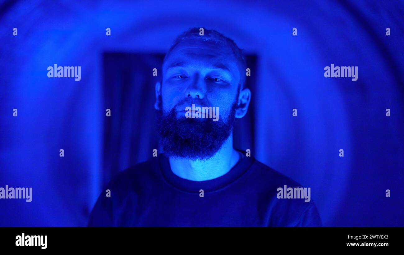 Portrait of a young stylish hipster man rapper moving and posing to the ...