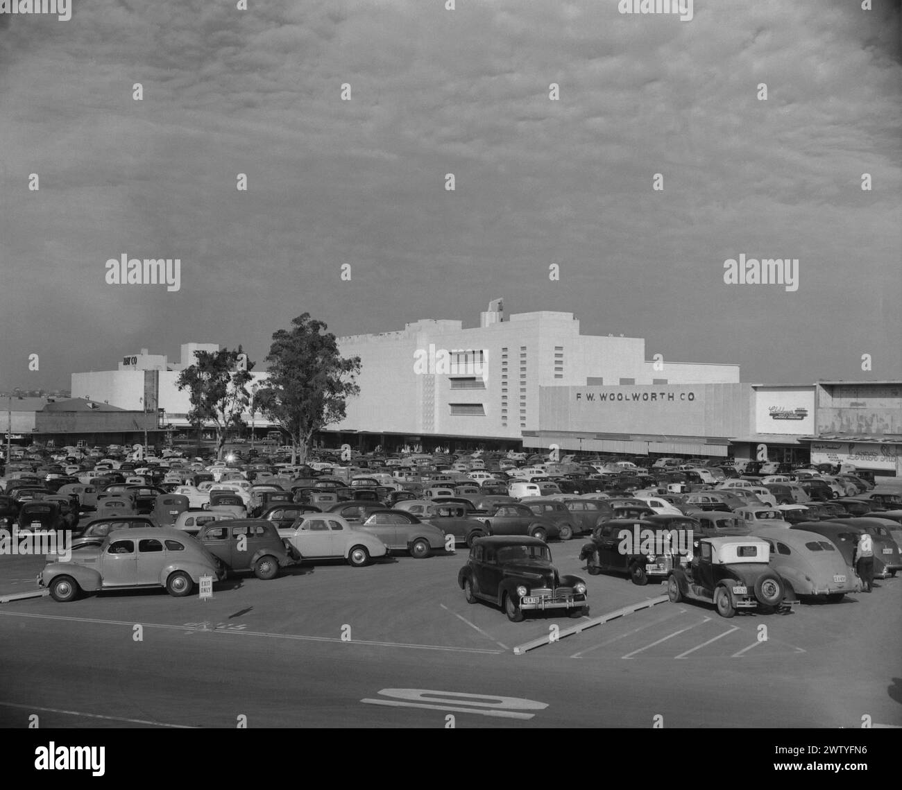 General view of a large, full shopping mall parking lot with anchor ...