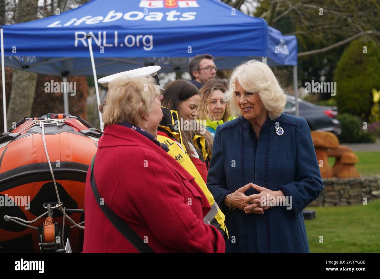 Queen Camilla (right) meets representatives from the RNLI during a ...