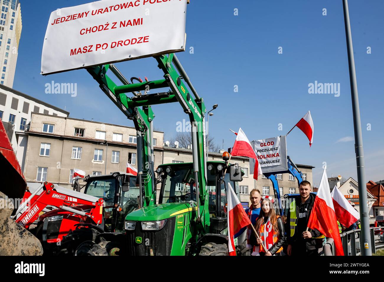 Polish farmers take to the streets in their tractors with Polish flags ...