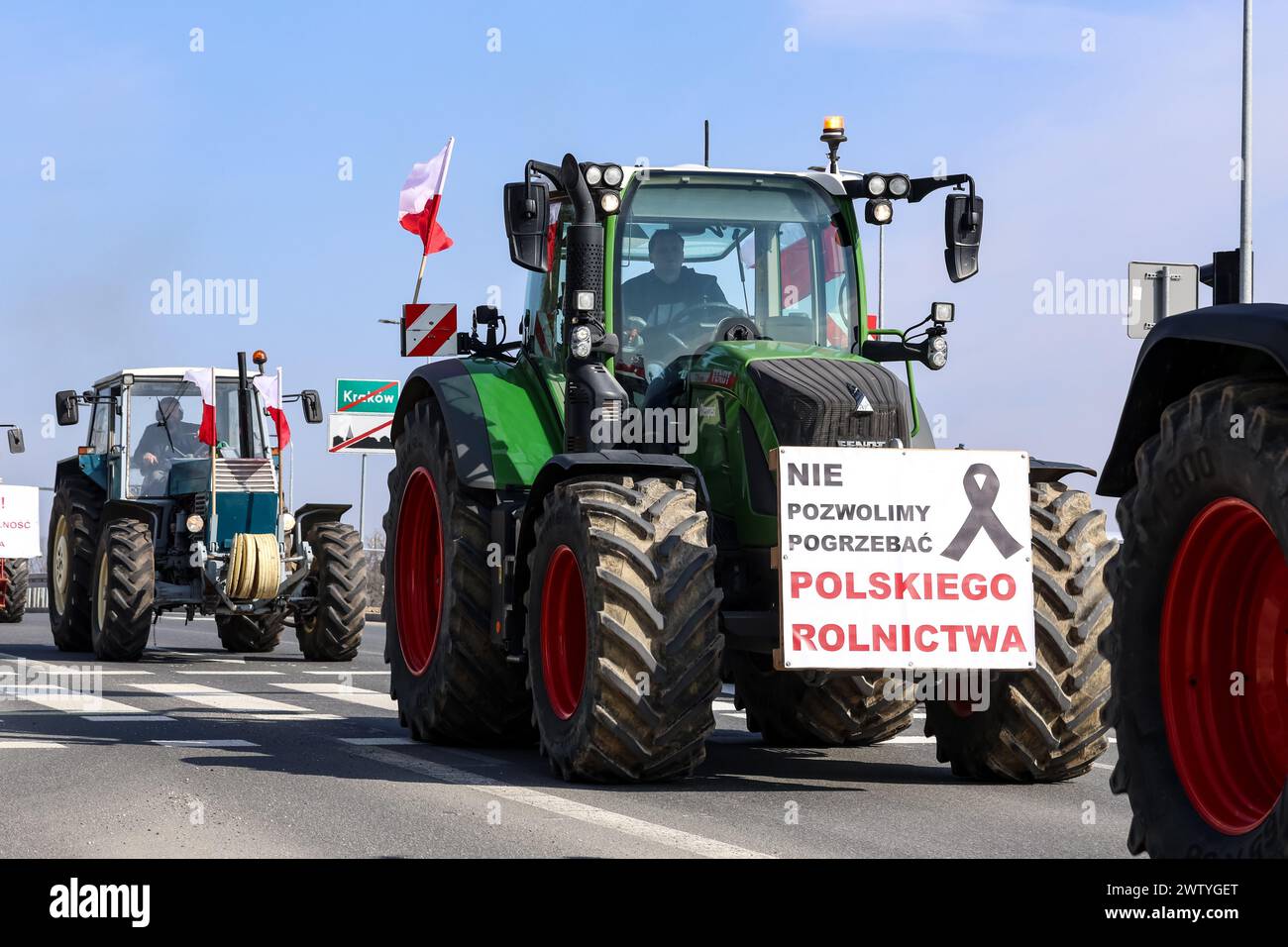Polish farmers take to the streets in their tractors with Polish flags ...