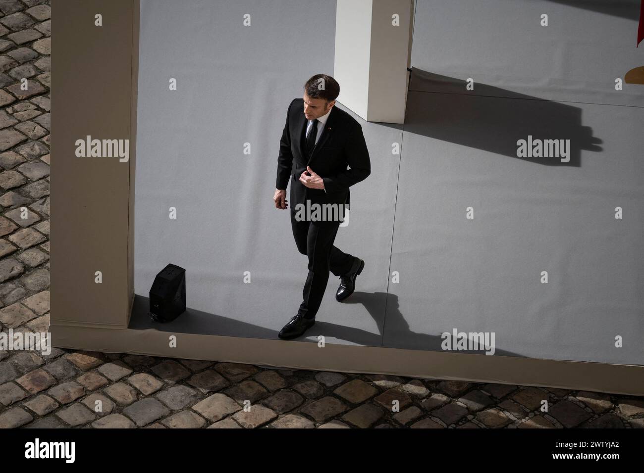 France's President Emmanuel Macron walks after his speech during a ...