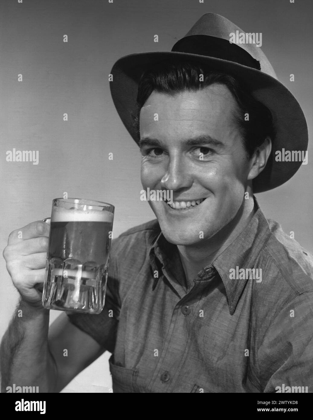 Cheerful man smiling broadly Black and White Stock Photos & Images - Alamy