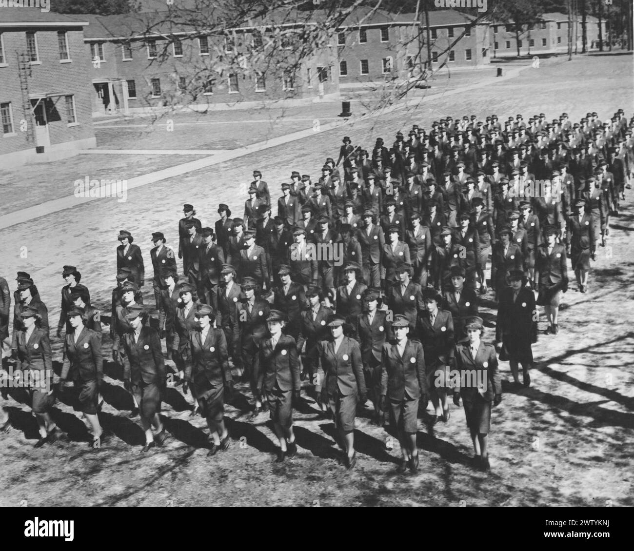 Large group of women Marines marching in formation at Camp LeJeune ...