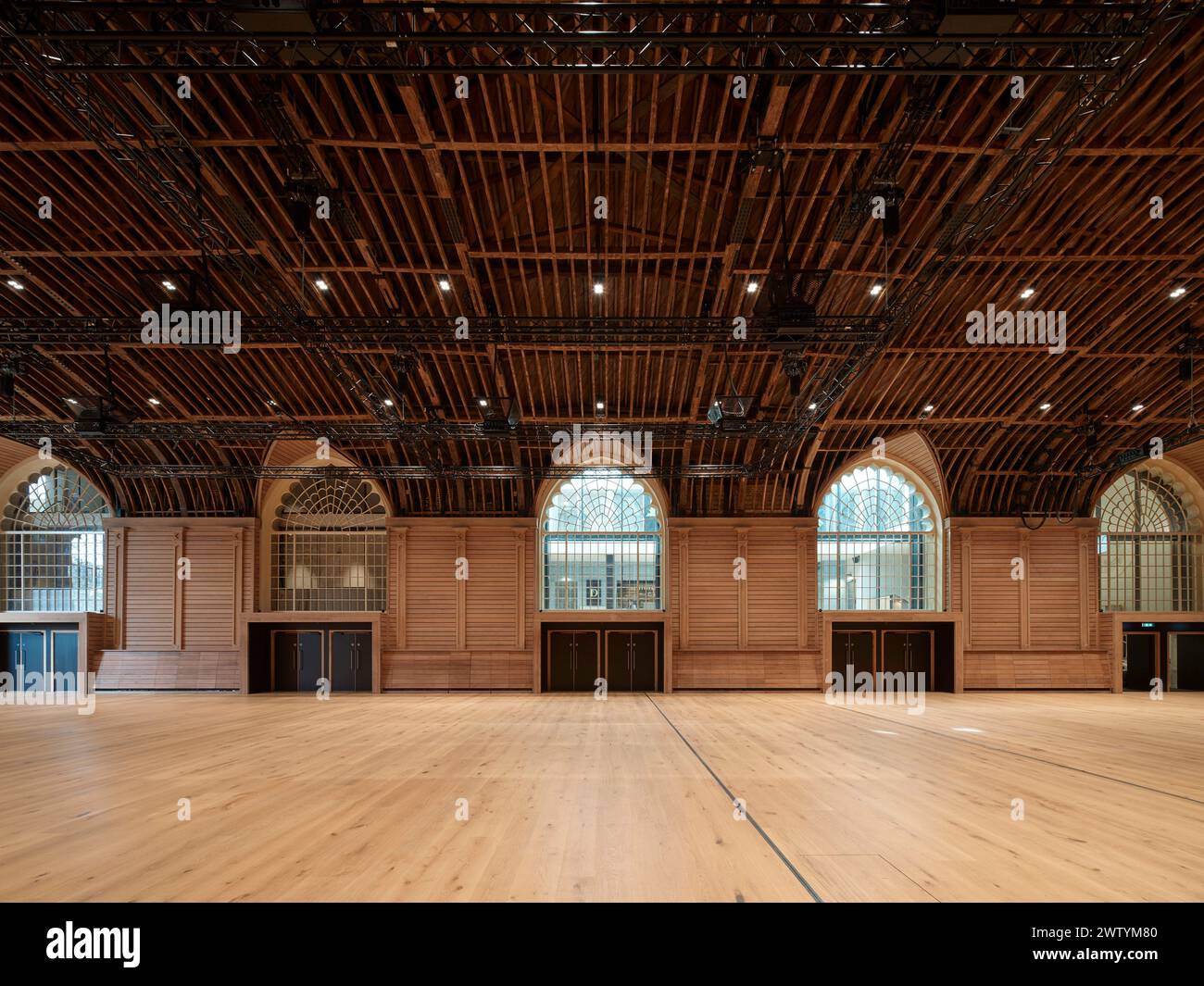 Empty auditorium with arched windows. Brighton Dome Corn Exchange and ...