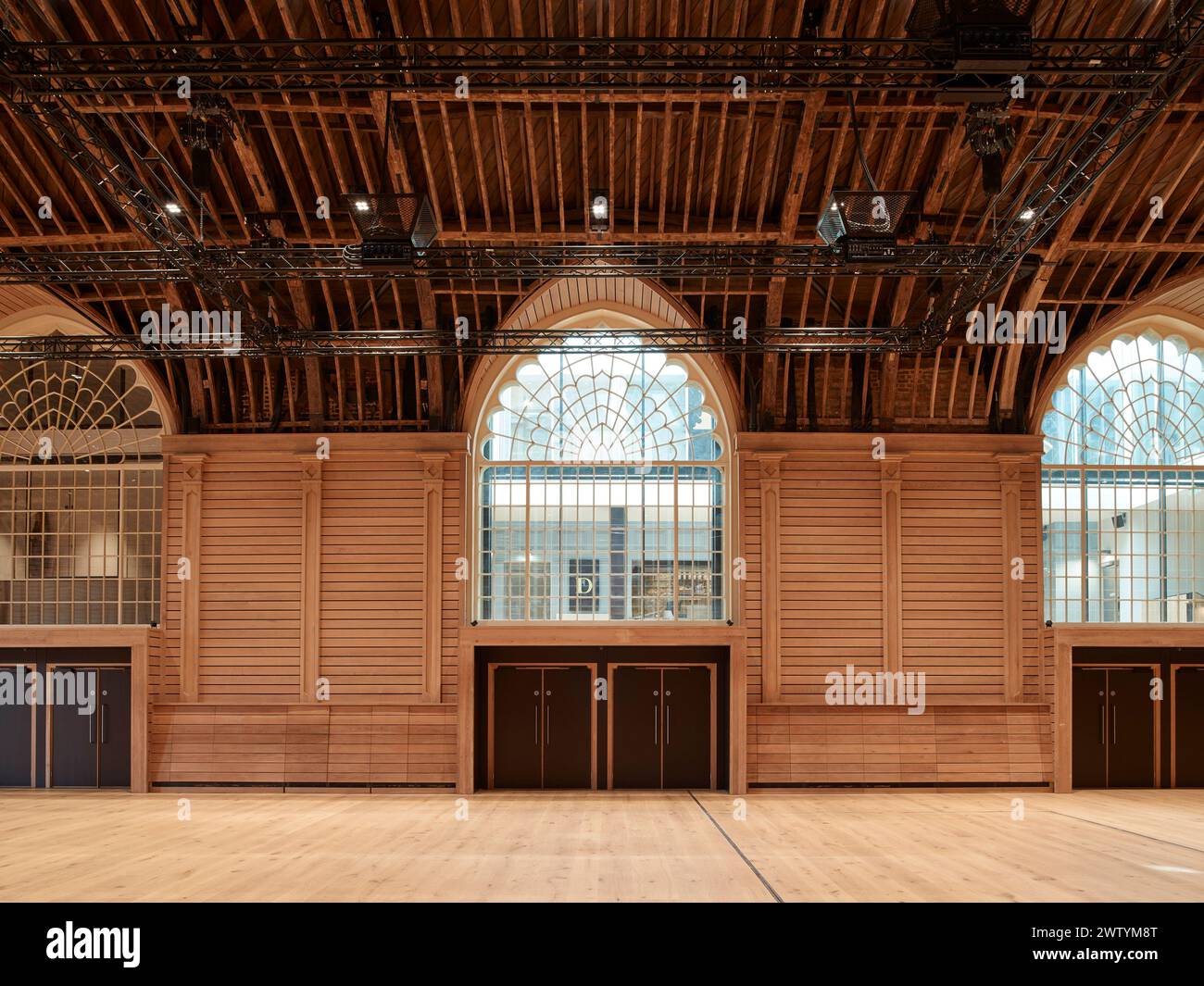 Empty auditorium with arched windows. Brighton Dome Corn Exchange and ...