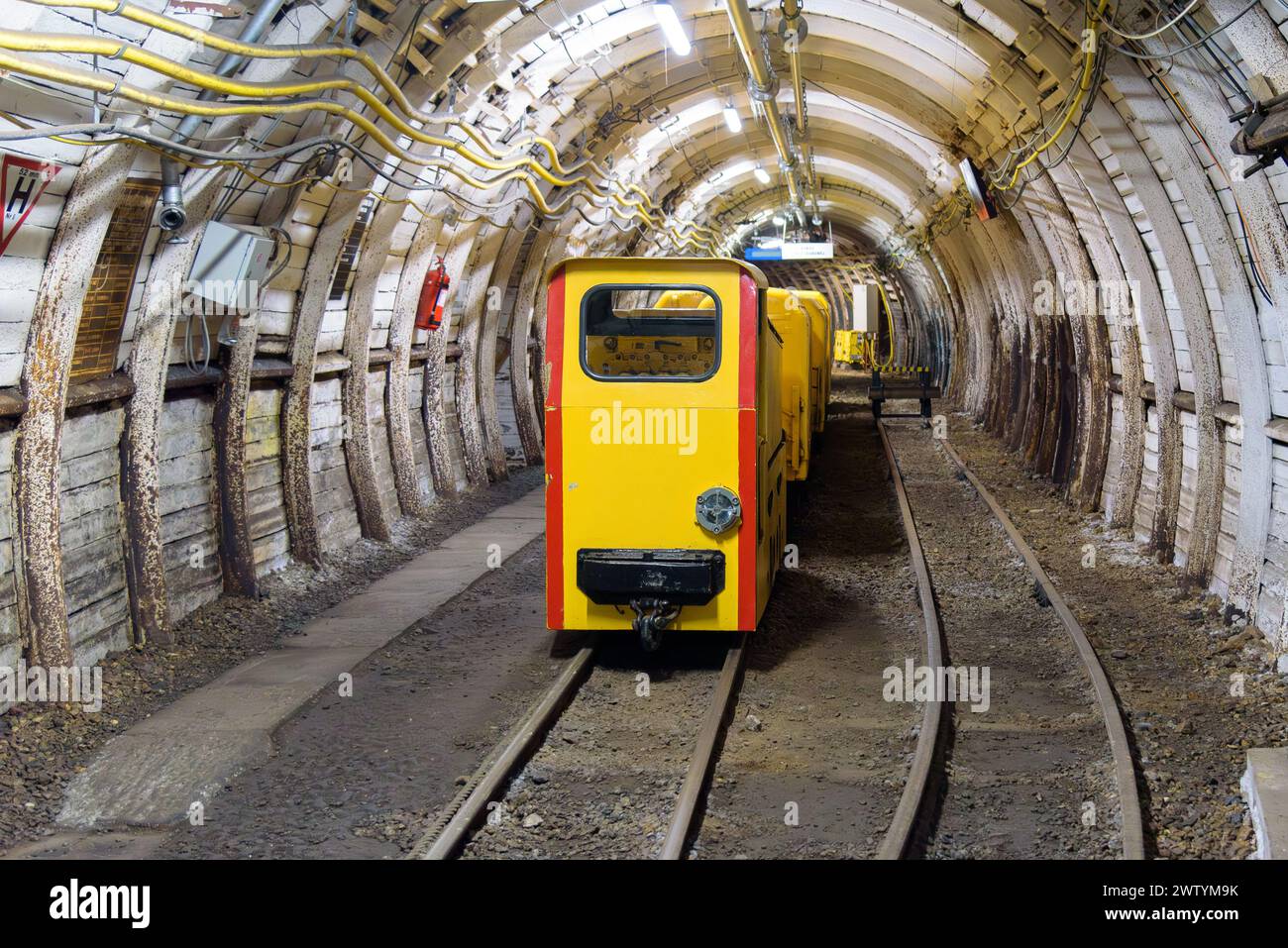 Passenger train in coal mine for miners transportation Stock Photo - Alamy