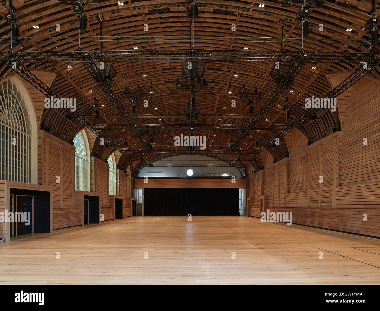 Empty auditorium with arched windows. Brighton Dome Corn Exchange and ...