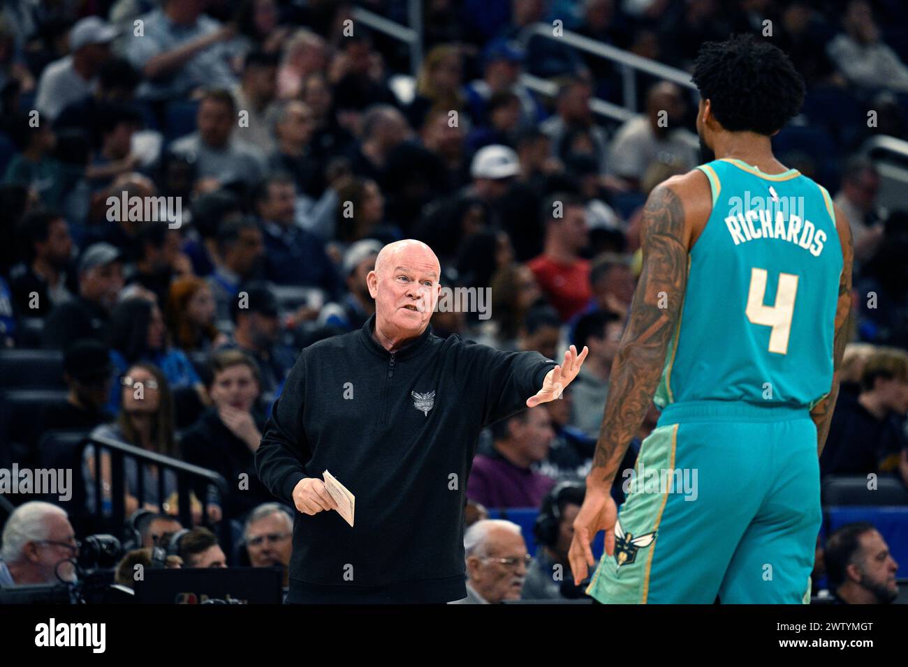 Charlotte Hornets head coach Steve Clifford, left, talks with center ...