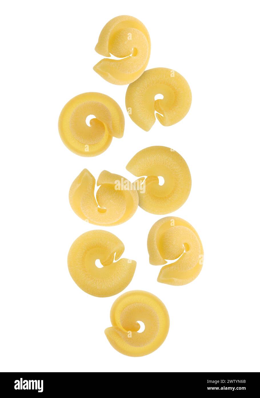 Raw dischi volanti pasta flying on white background Stock Photo - Alamy