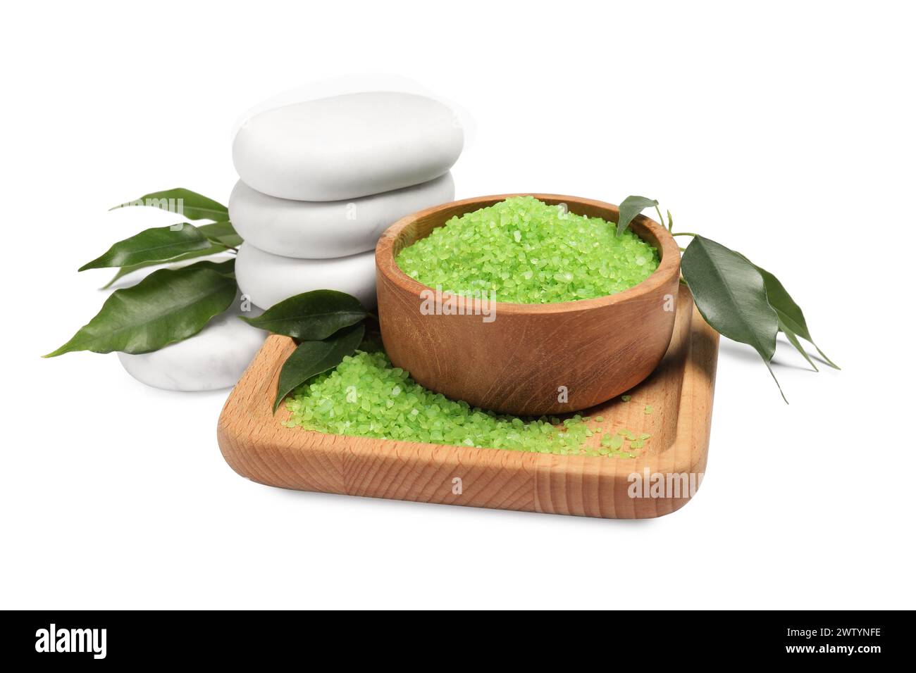 Green sea salt in bowl, spa stones and leaves isolated on white Stock ...