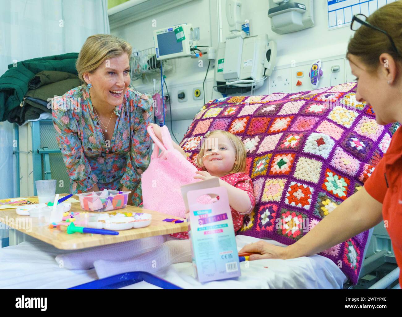 The Duchess of Edinburgh meets patient Astrid Walker, 2, during a visit ...