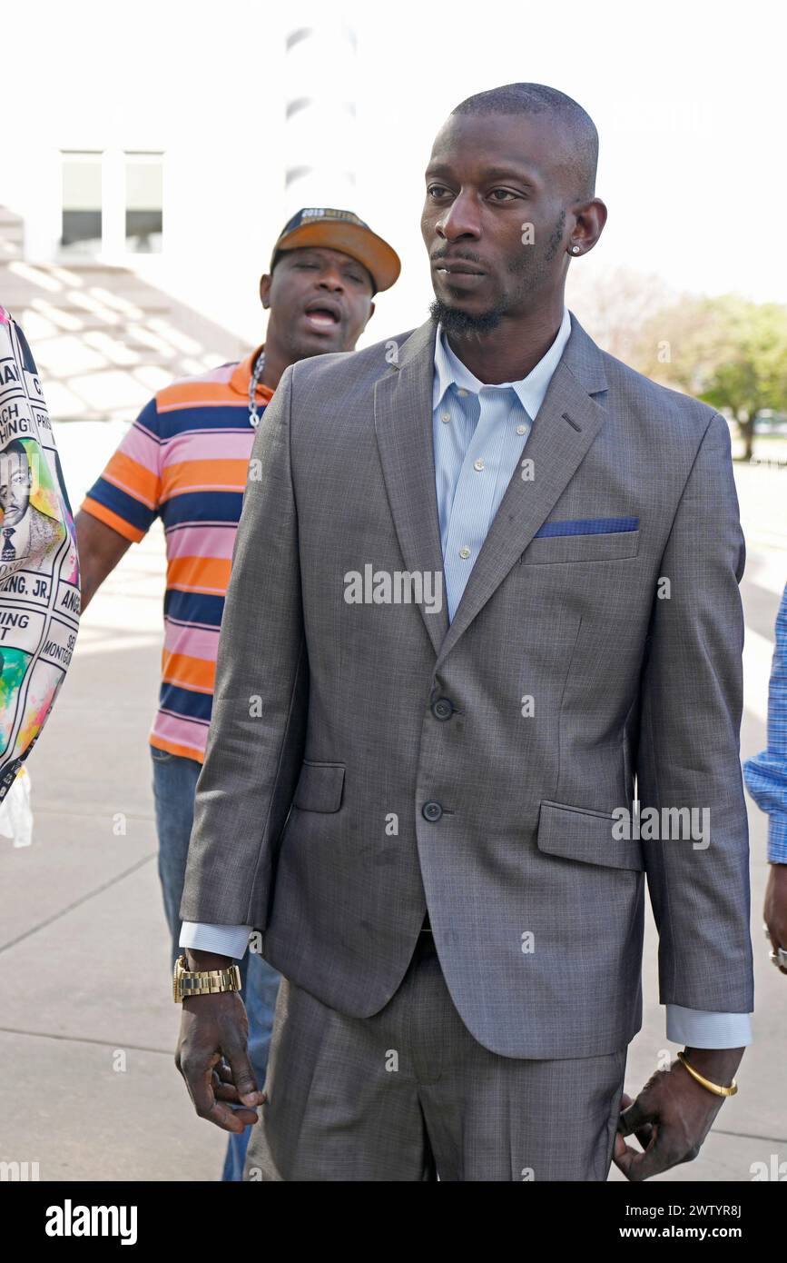 Michael Corey Jenkins, foreground, and Eddie Terrell Parker enter the ...