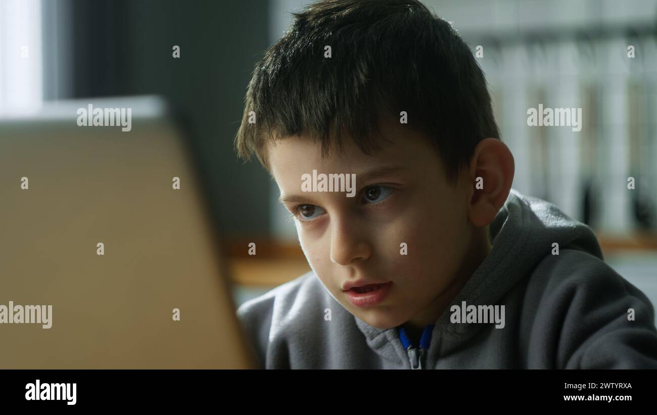 Boy school typing children hi-res stock photography and images - Alamy