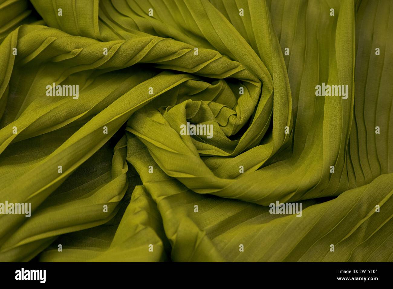 A Teal green fabric overlapping pattern on the center Stock Photo - Alamy