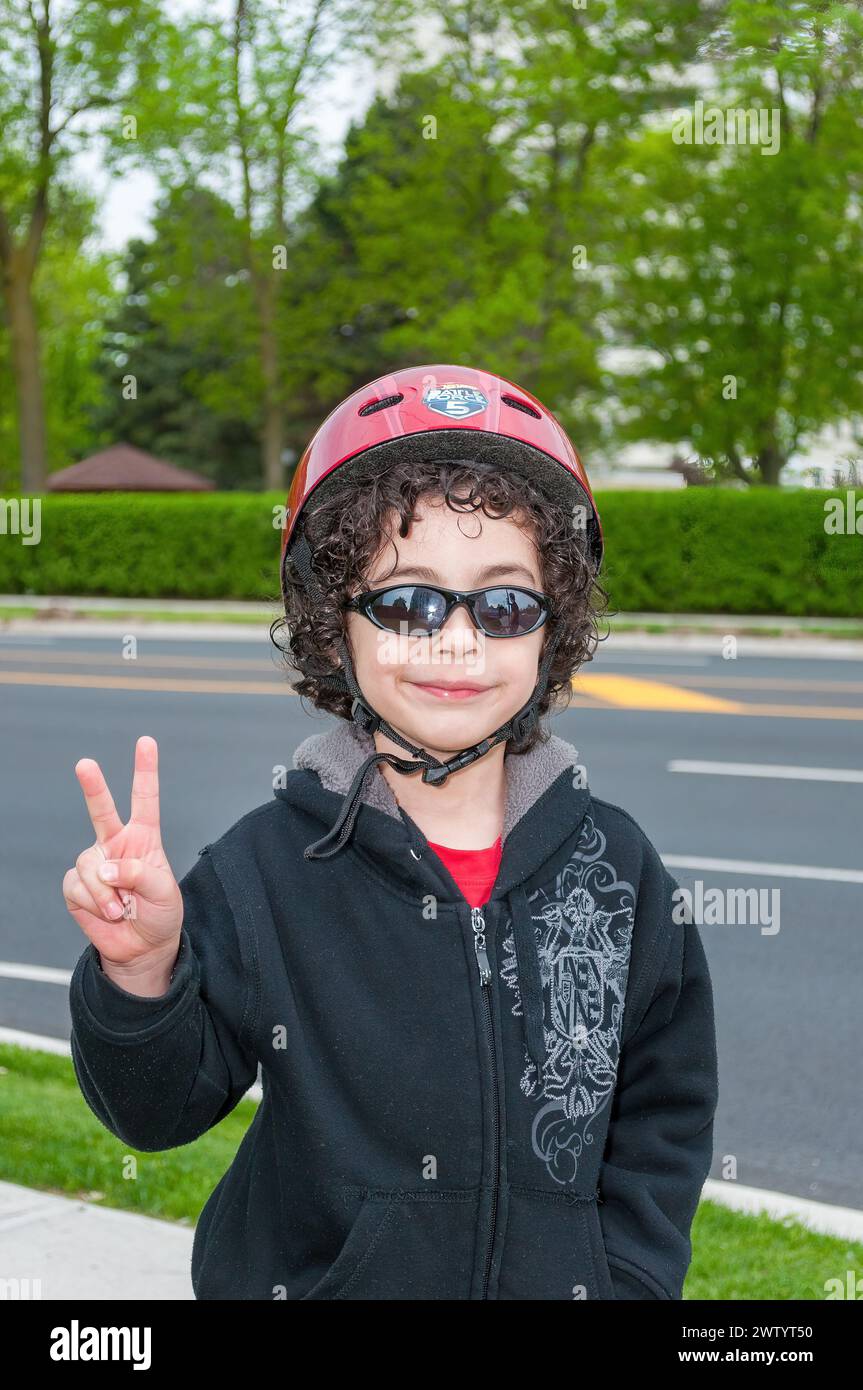 Child boy learning to ride bicycle Stock Photo - Alamy